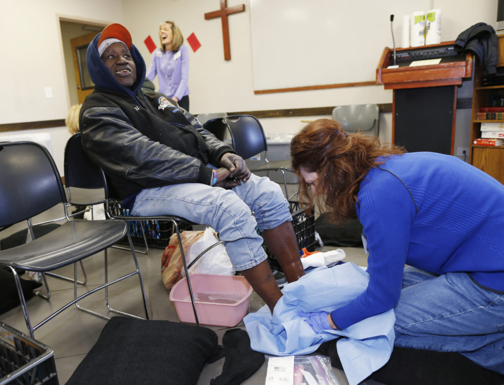 Photos: On Easter weekend, volunteers wash feet of Denver homeless