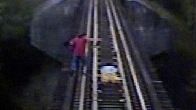 Woman Tied To Train Tracks