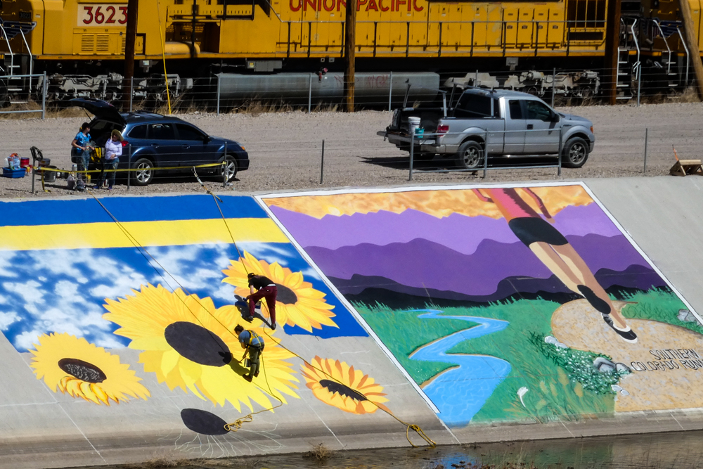 Artists paint Ukrainian sunflowers and dozens of other murals as art ...