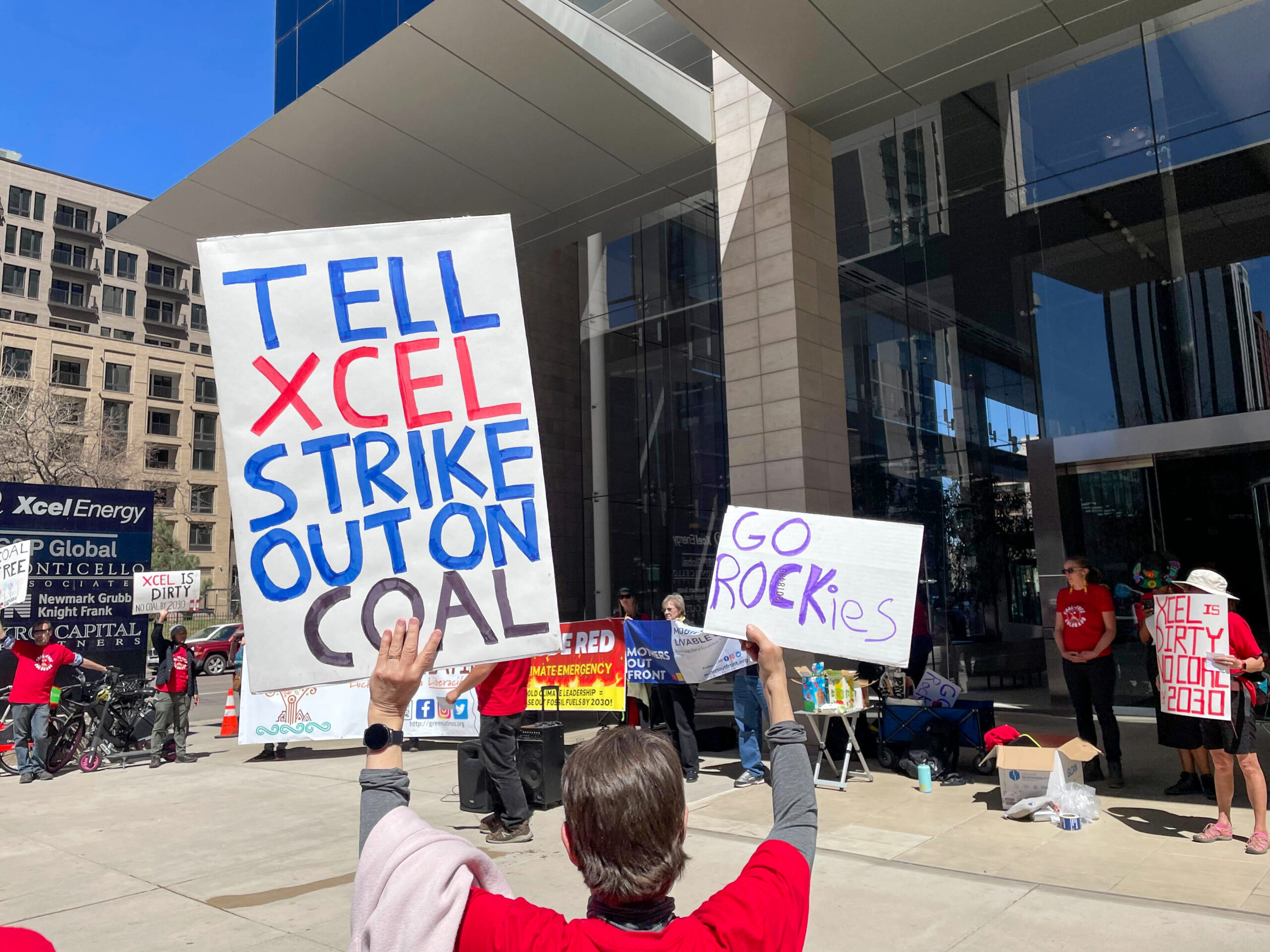 Thousands walked to Coors Field for the Rockies opener. Activists saw a ...
