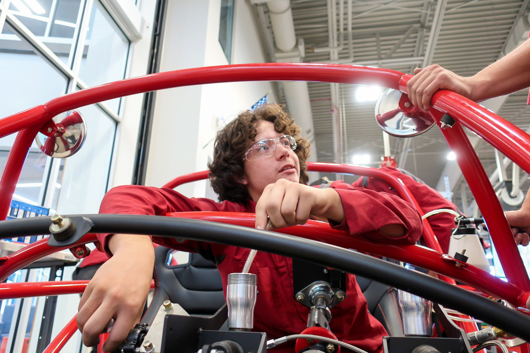 Popping the hood on electrical vehicles, these high school students ...