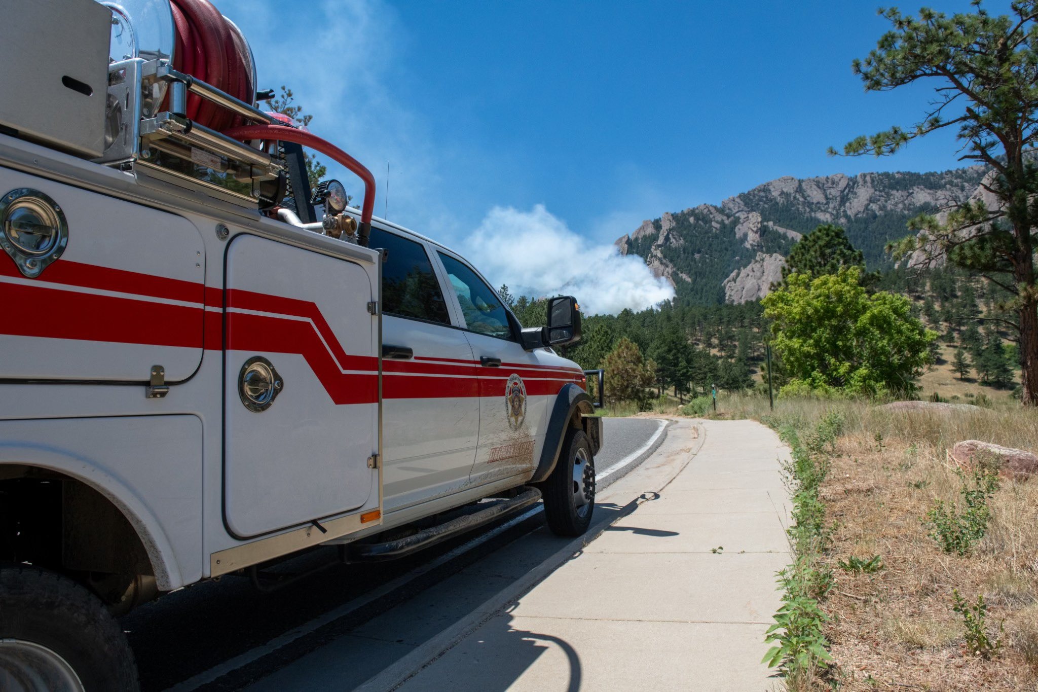 Crews working to extinguish wildfire southwest of Boulder