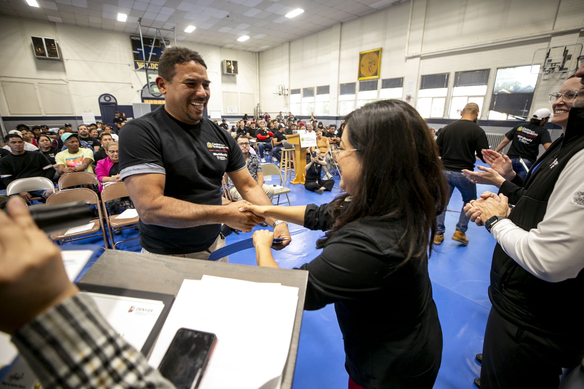 Listen: Asylum seekers in Denver celebrate new skills as they prepare to enter the workforce