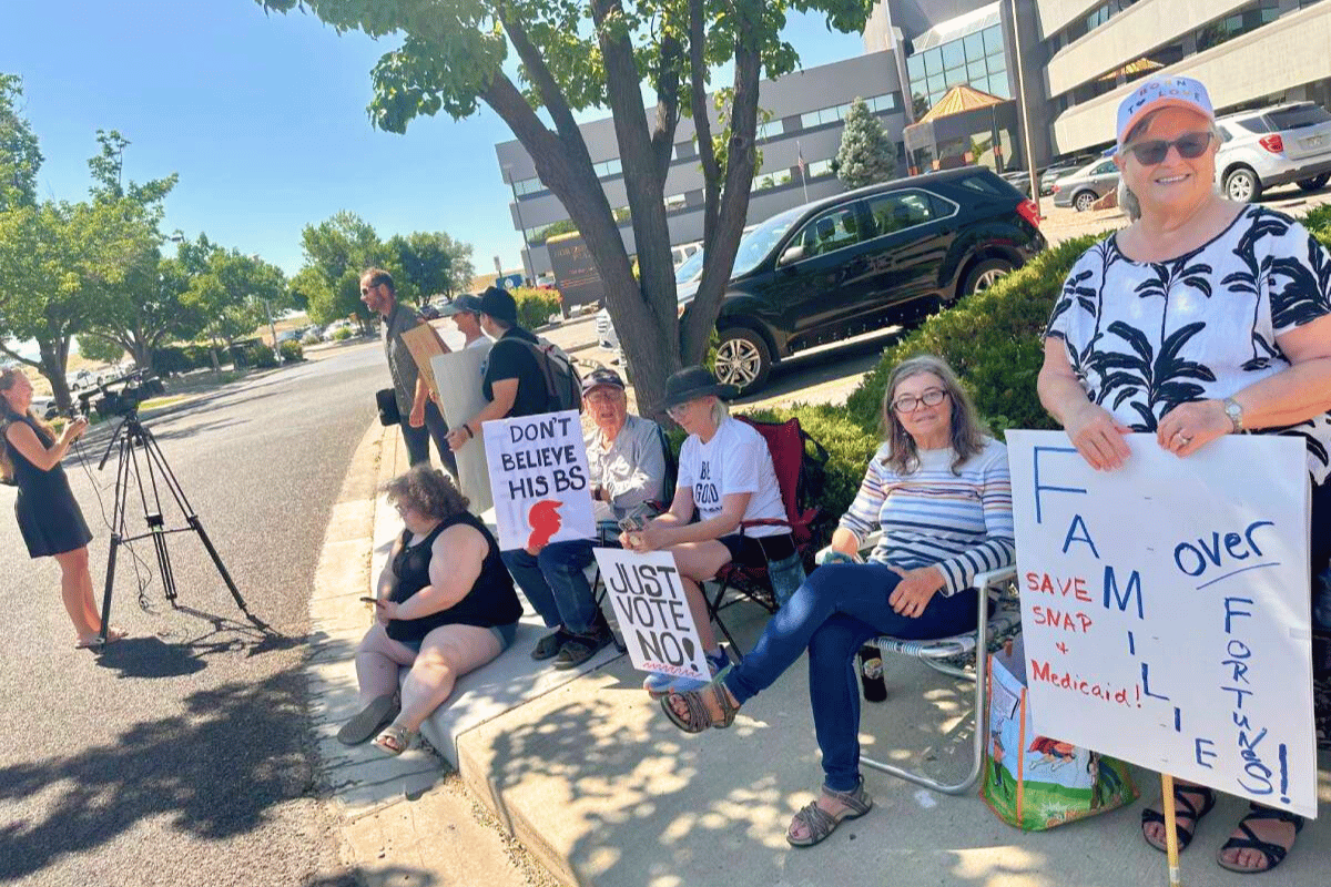 Protesters stage sit-in over federal spending bill outside Rep. Hurd’s ...